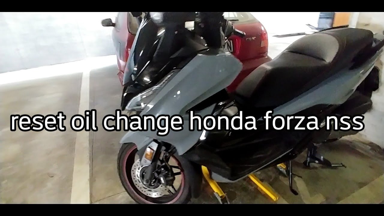 reset oil change honda forza - YouTube