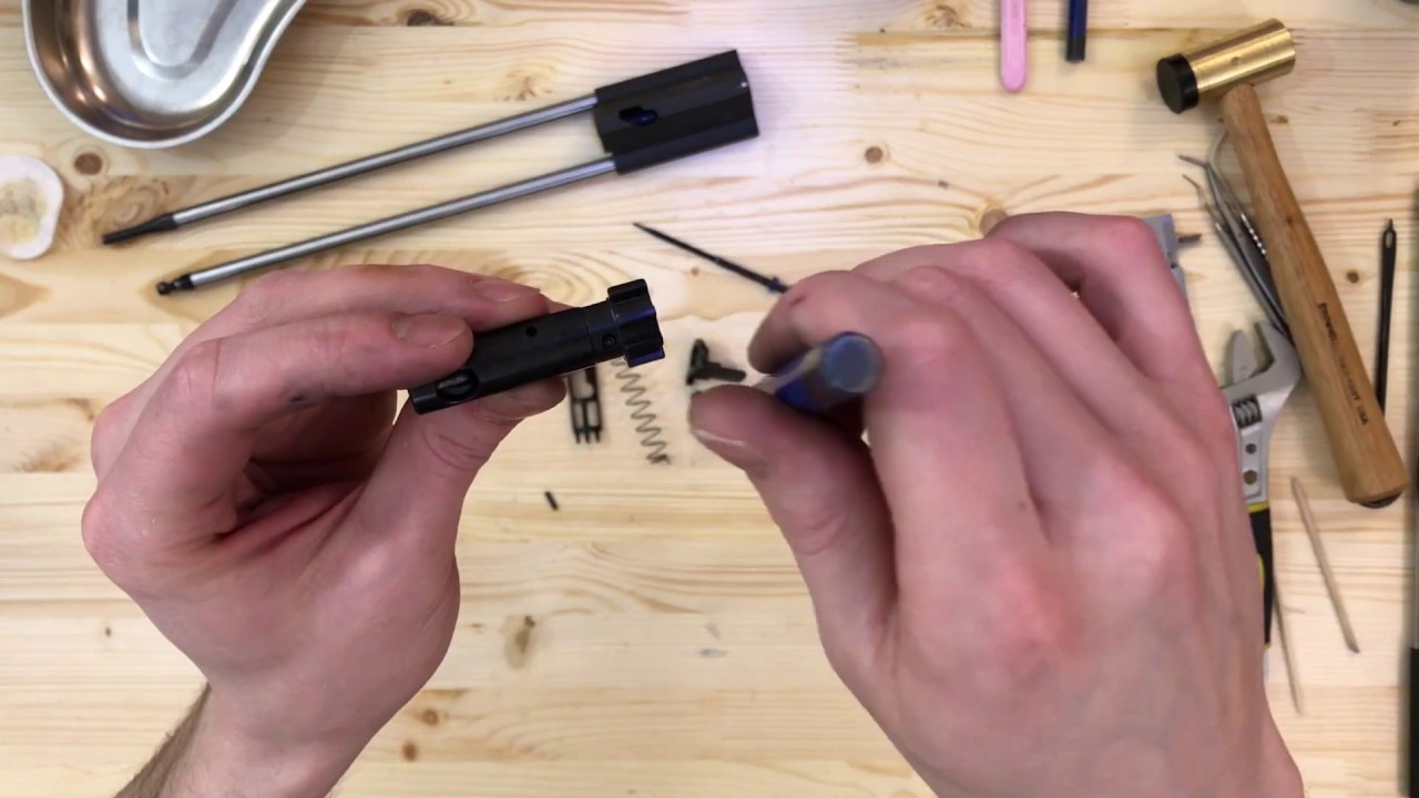 Steyr AUG bolt carrier .223 & 9mm disassembly and assembly - YouTube