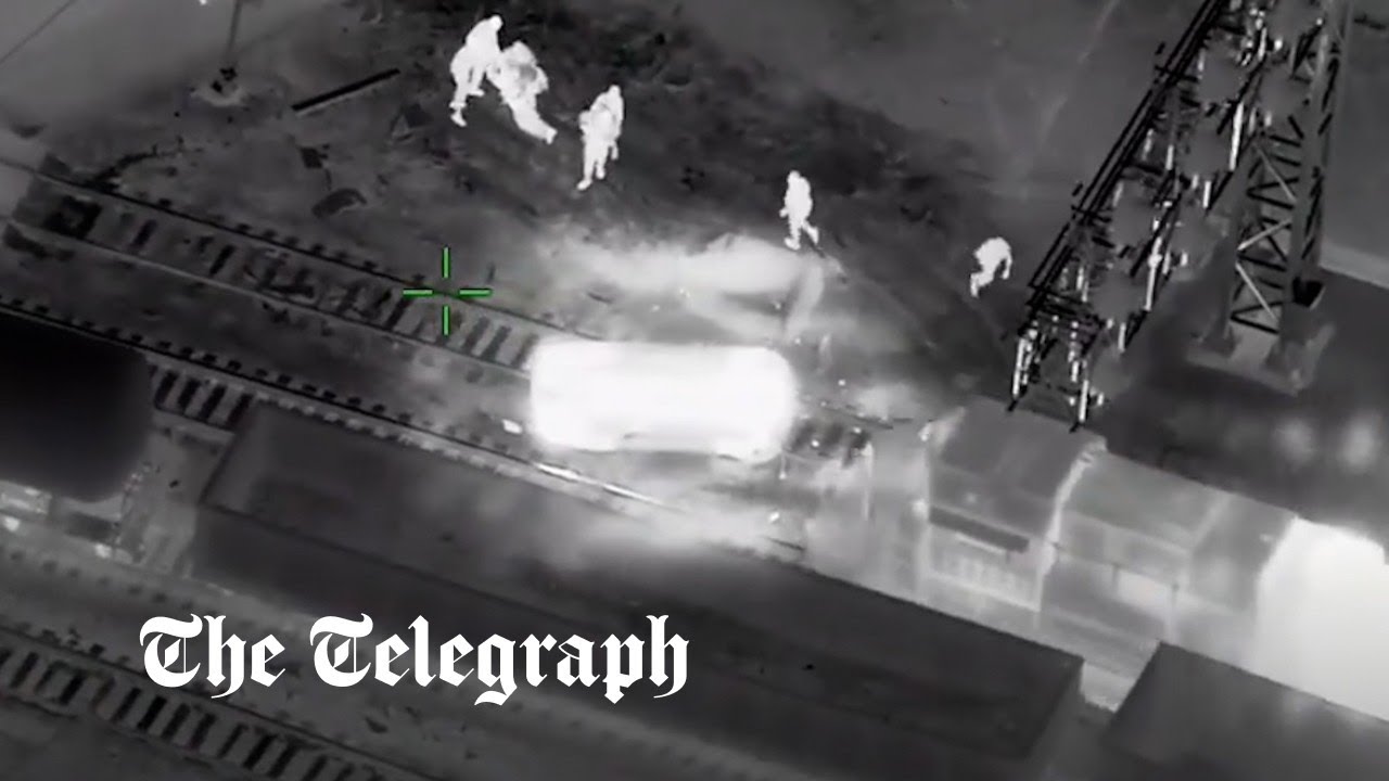 Train smashes into hijacked patrol car following police chase in US ...