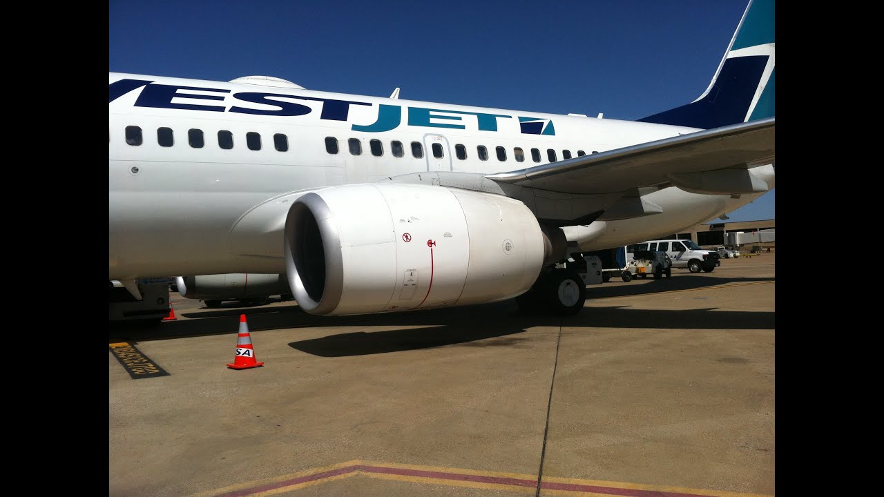West Jet Inaugural Service to DFW Airport from Calgary - YouTube