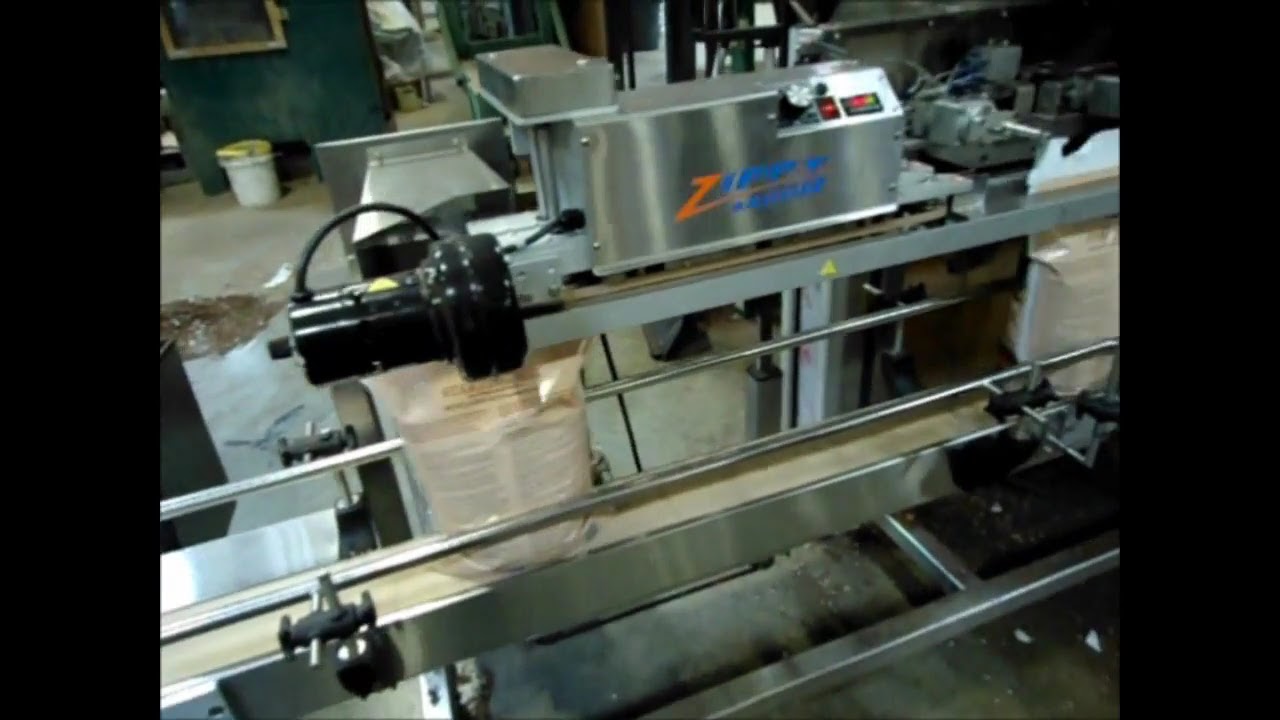 Zippy Bagger for packaging fertilizer and grass seed into pouches - YouTube