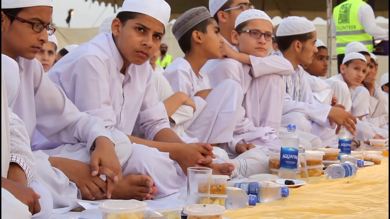 KARACHI, People gather at the 'Mosque Jamia Baitussalam for iftar fast ...