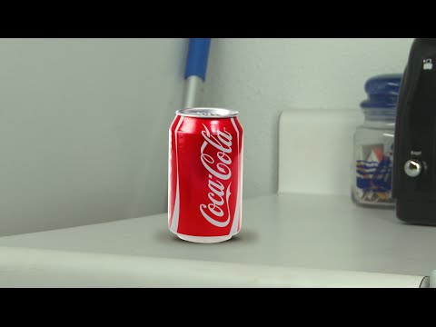 Squashing a Soda Pop (Coke) - YouTube