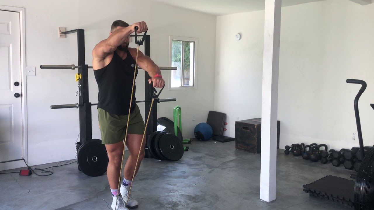 Banded Alternating Front Raises with Static Hold on Opposite Arm - YouTube