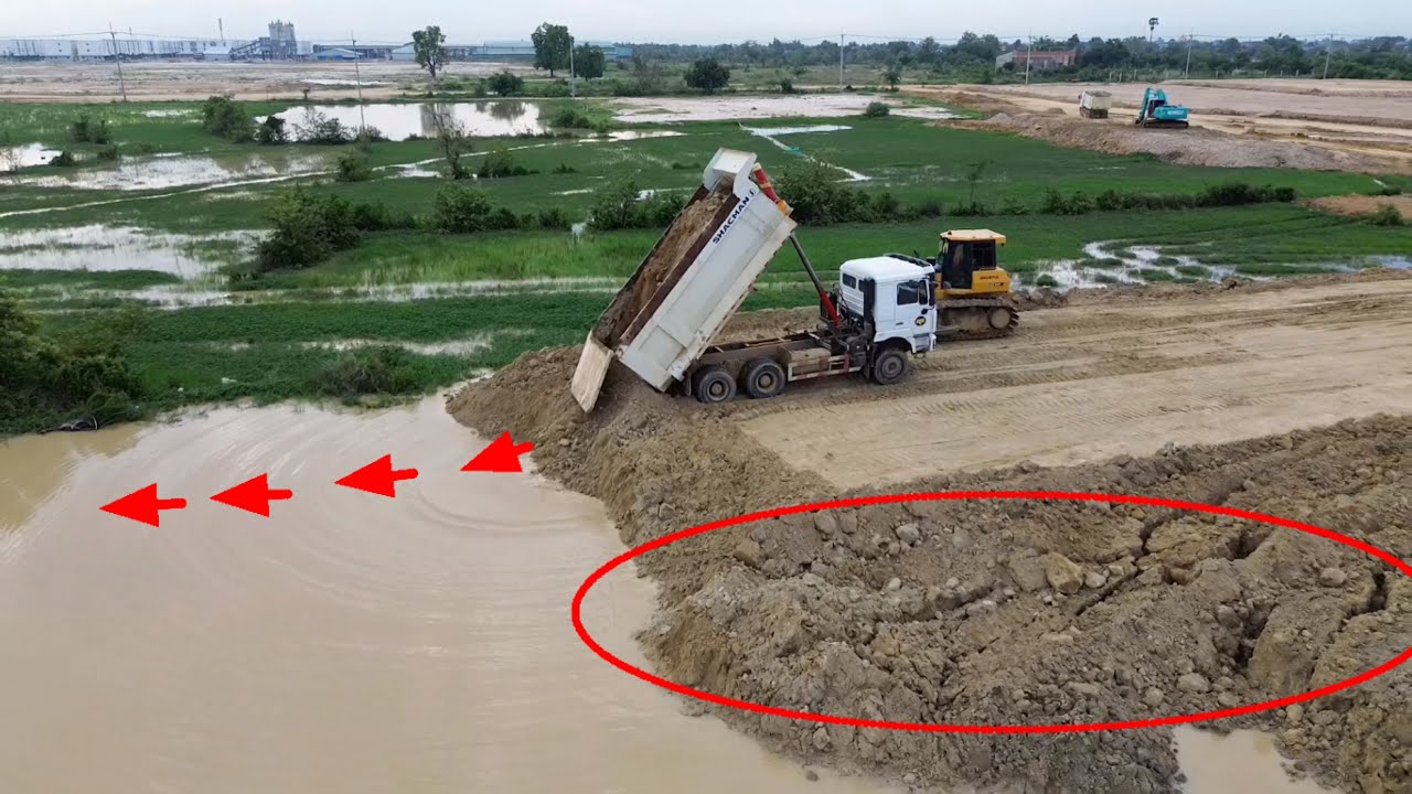 Part 7, Excellent technique bulldozer filling up land with dump trucks ...