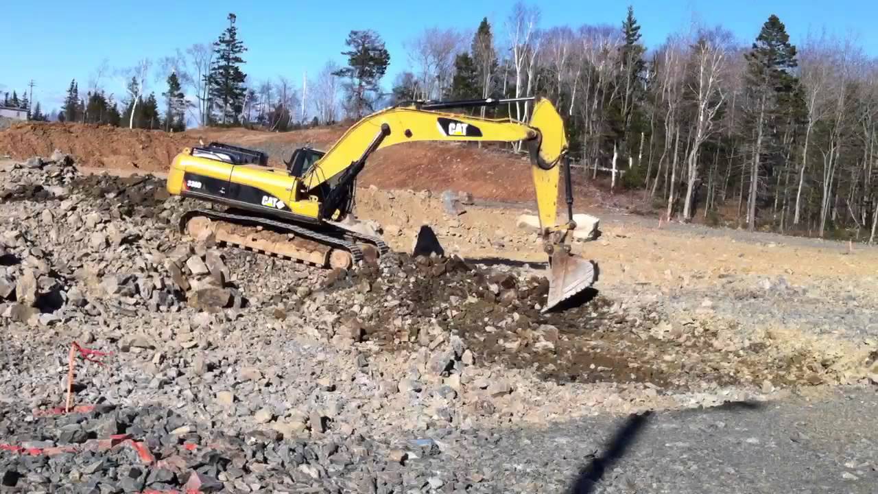 Cat 330D L Digging Rocks - YouTube