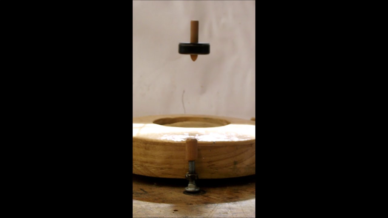 Levitation spinning magnetic top weight adjust - YouTube