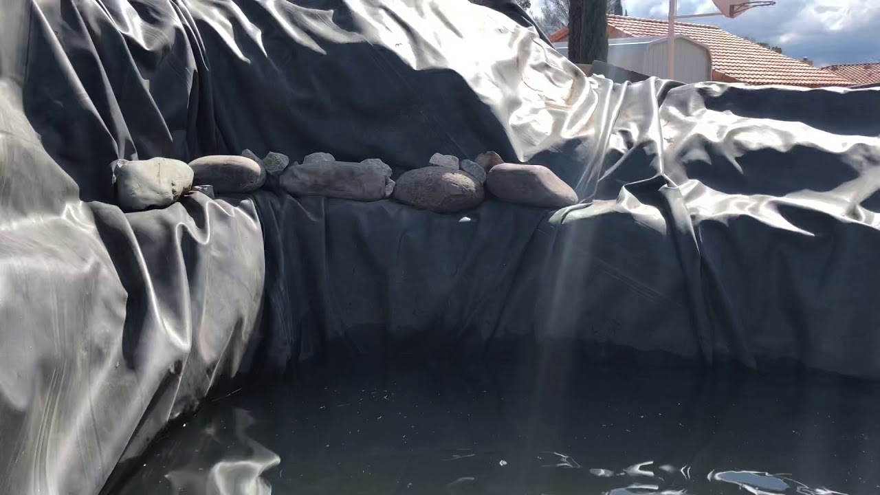 7000 gallon DIY pond build. Setting coping & jets - YouTube