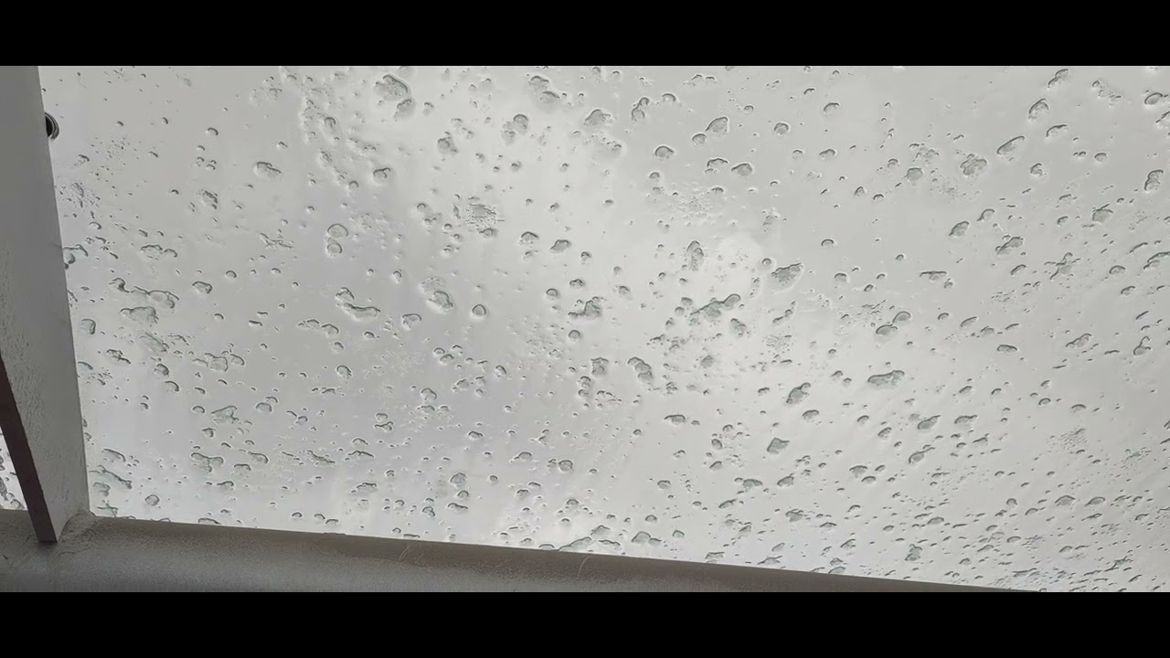 hail storm in a bus shelter - YouTube