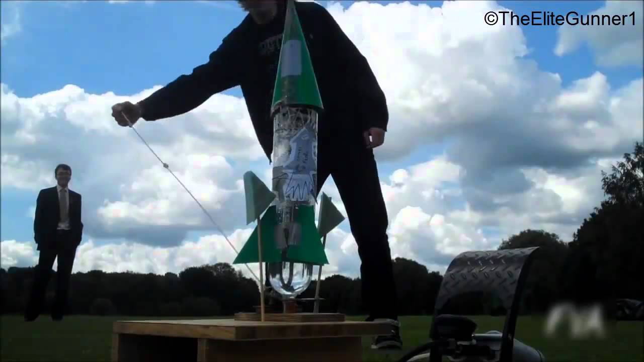 A guy gets hit in the face by a bottle rocket - YouTube