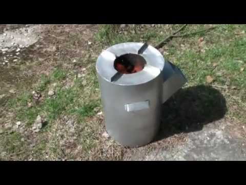 DIY biomass burning rocket stove - gravity feed - YouTube