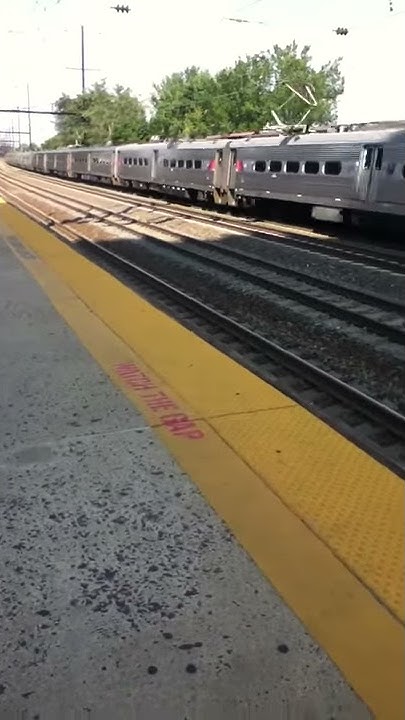 Aem-7 passing njt at new brunswick - YouTube