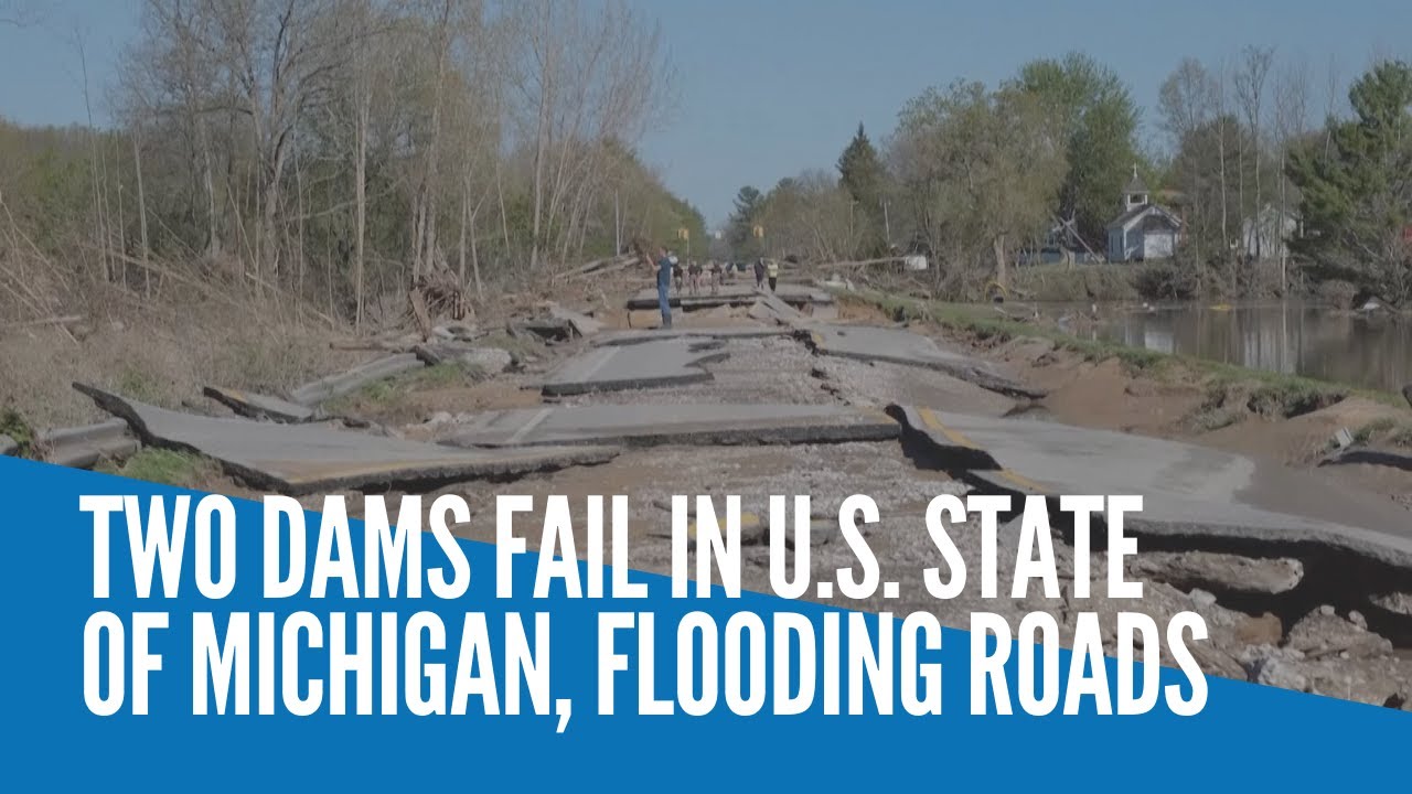 Two dams fail in US state of Michigan, flooding roads - YouTube