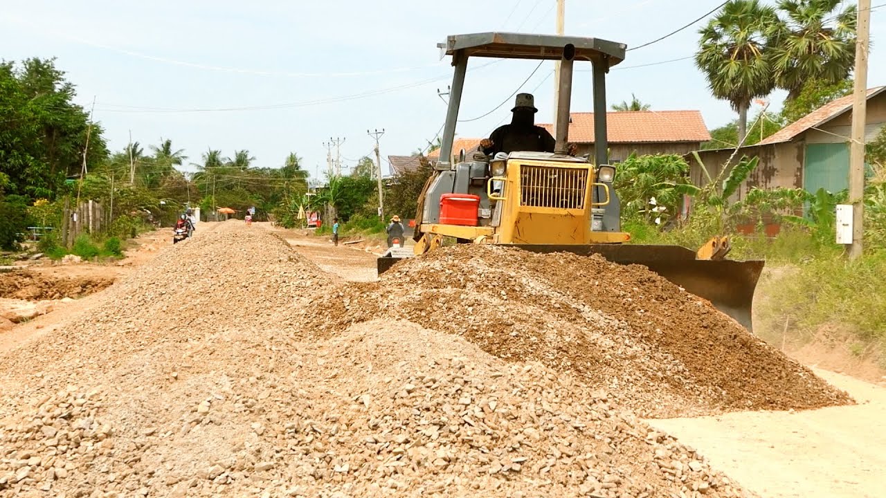 The Construction of a Road Foundation Using a Dozer Operator and a Dump ...