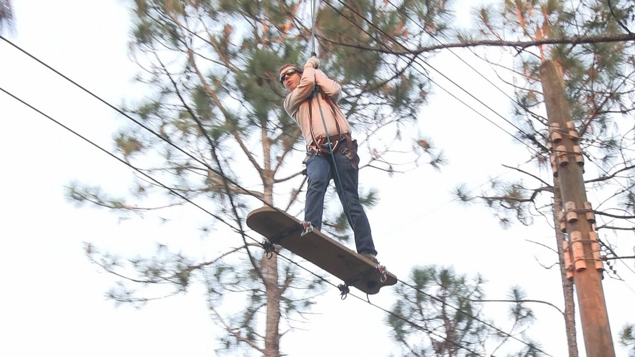 Make your way through the trees at Orlando Tree Trek Adventure Park ...