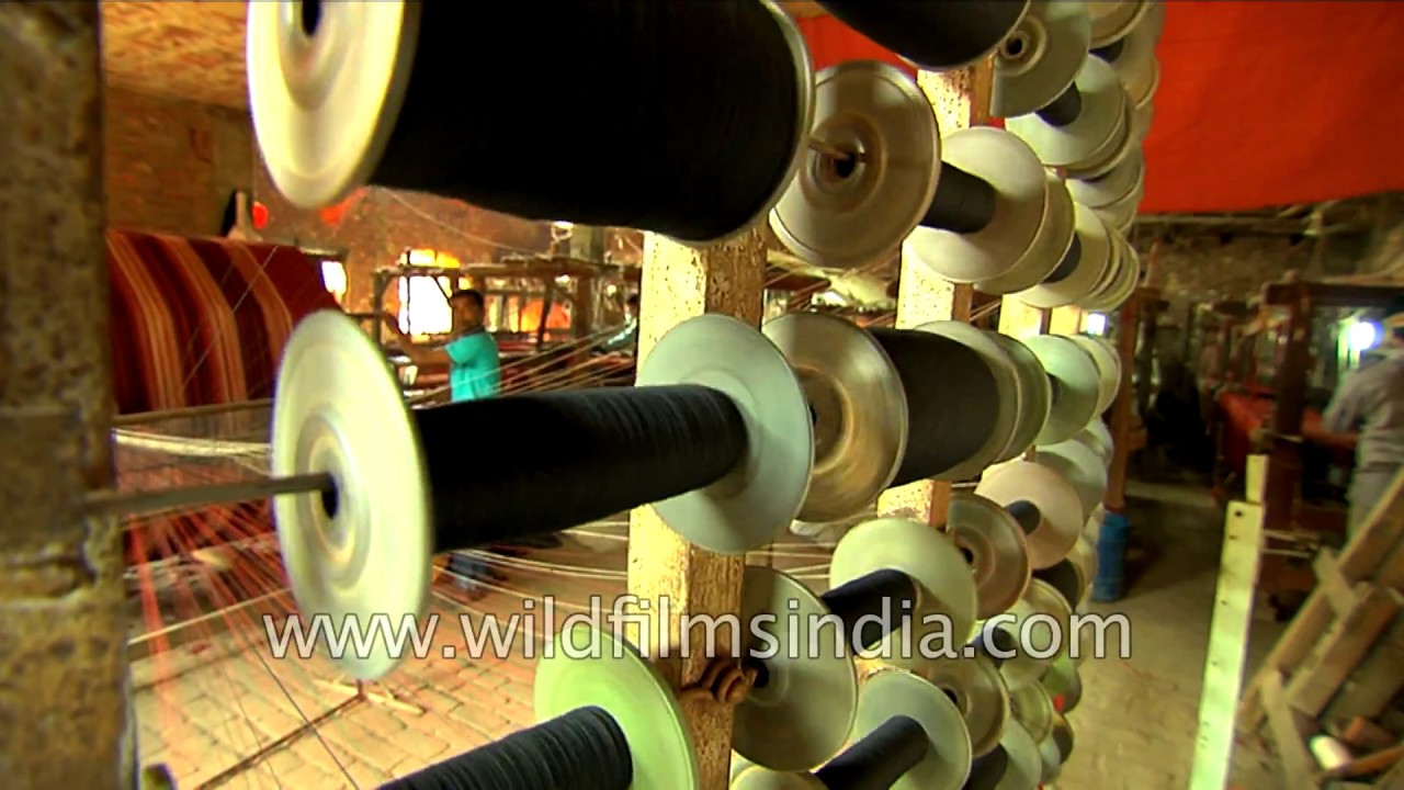 Yarn spindles at Textile manufacturing unit Nawagaon, Uttar Pradesh ...
