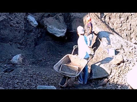Breaking Rocks And Loading Sand Into Trucks Until Full.. - YouTube