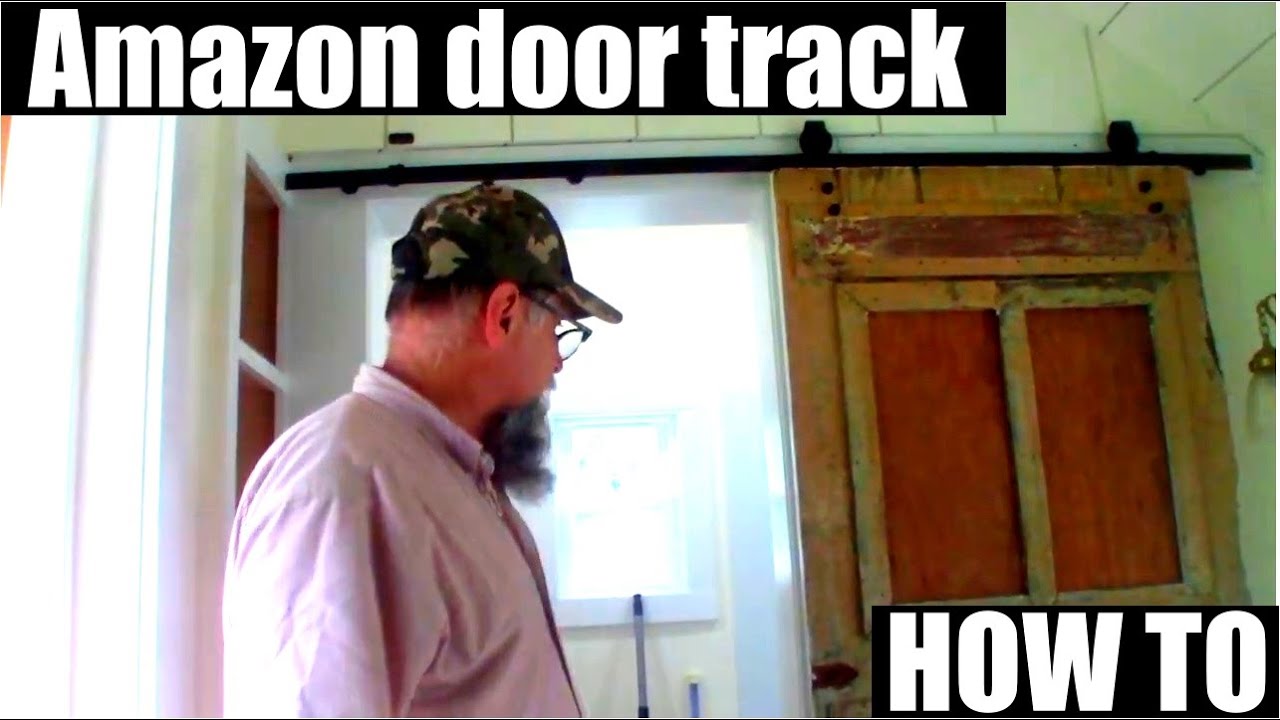 How to install a cheap amazon barn door track - YouTube