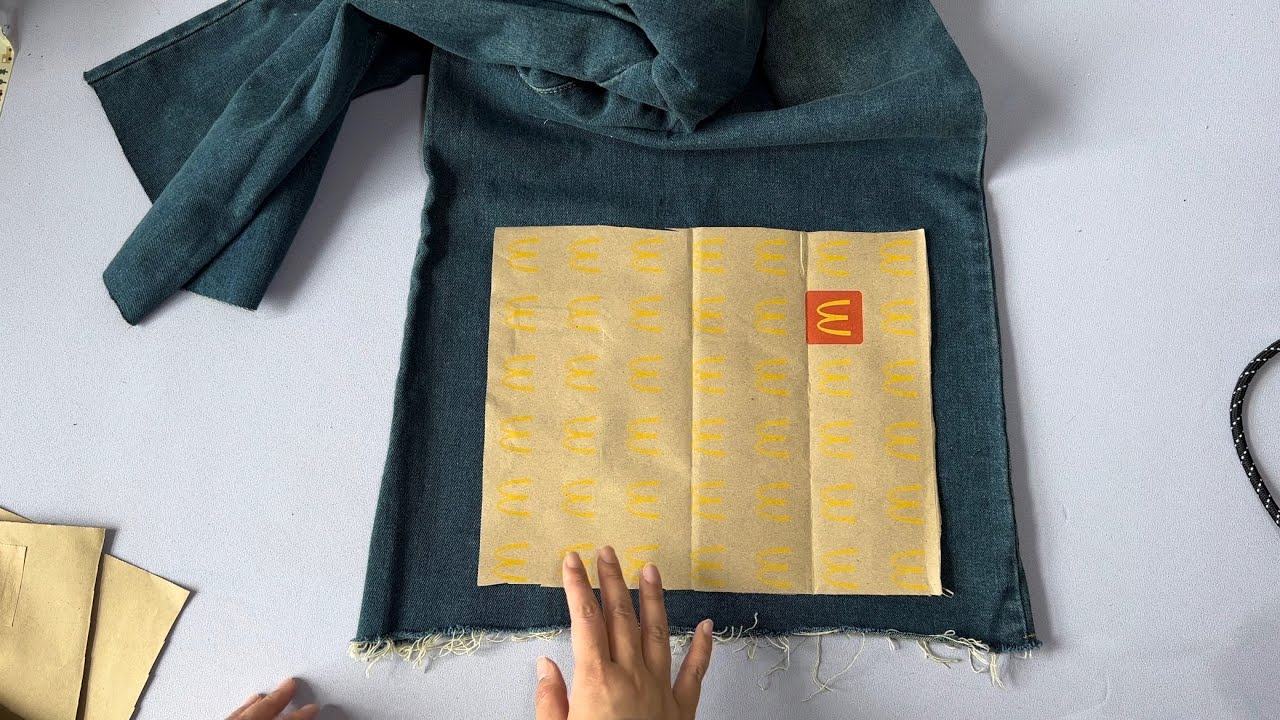 Make a long-lasting shopping bag out of old pants. Creates a new bag ...