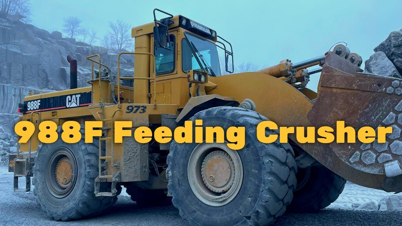 Jaw Crusher fed by 988F Loader - YouTube