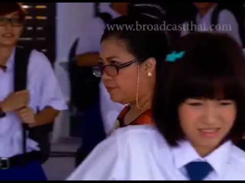 Teacher caning her students