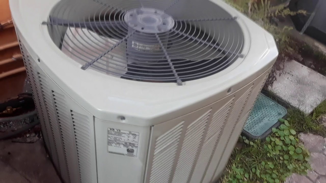 Several more Heat pumps and straight-cool units at a condo apartment ...