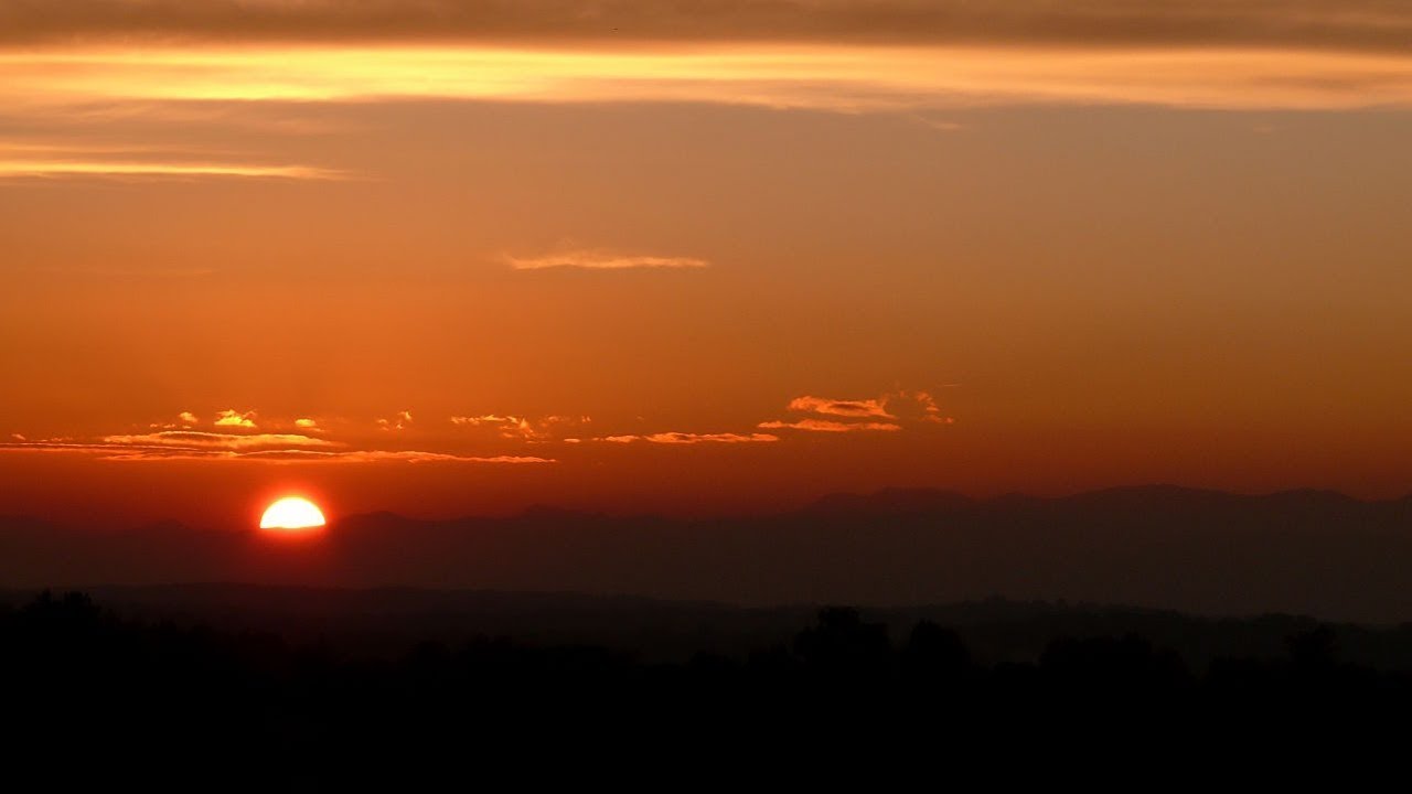 The sun sets in a spring of dark mud?? - YouTube