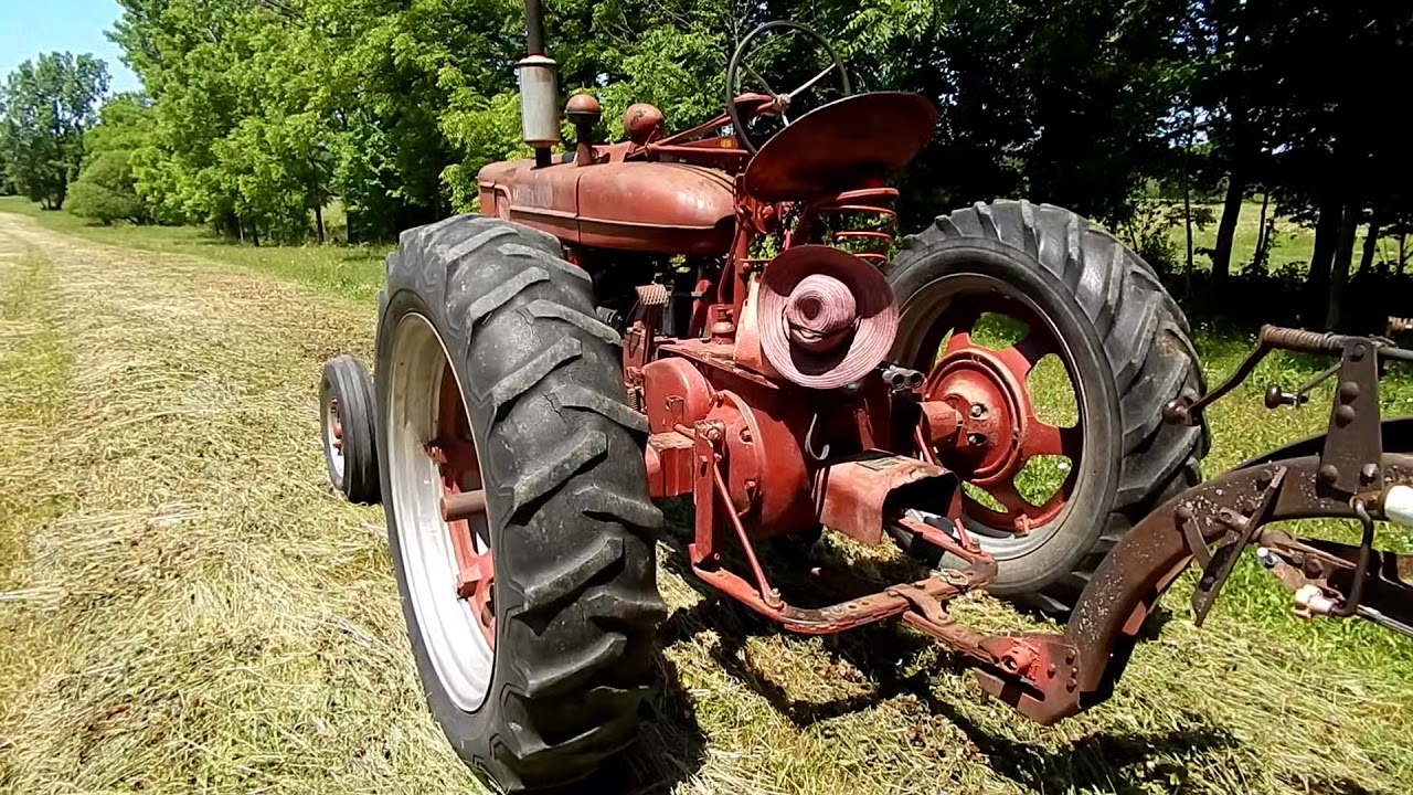 Raking Hay (Lynette loves her Farmall M) - YouTube