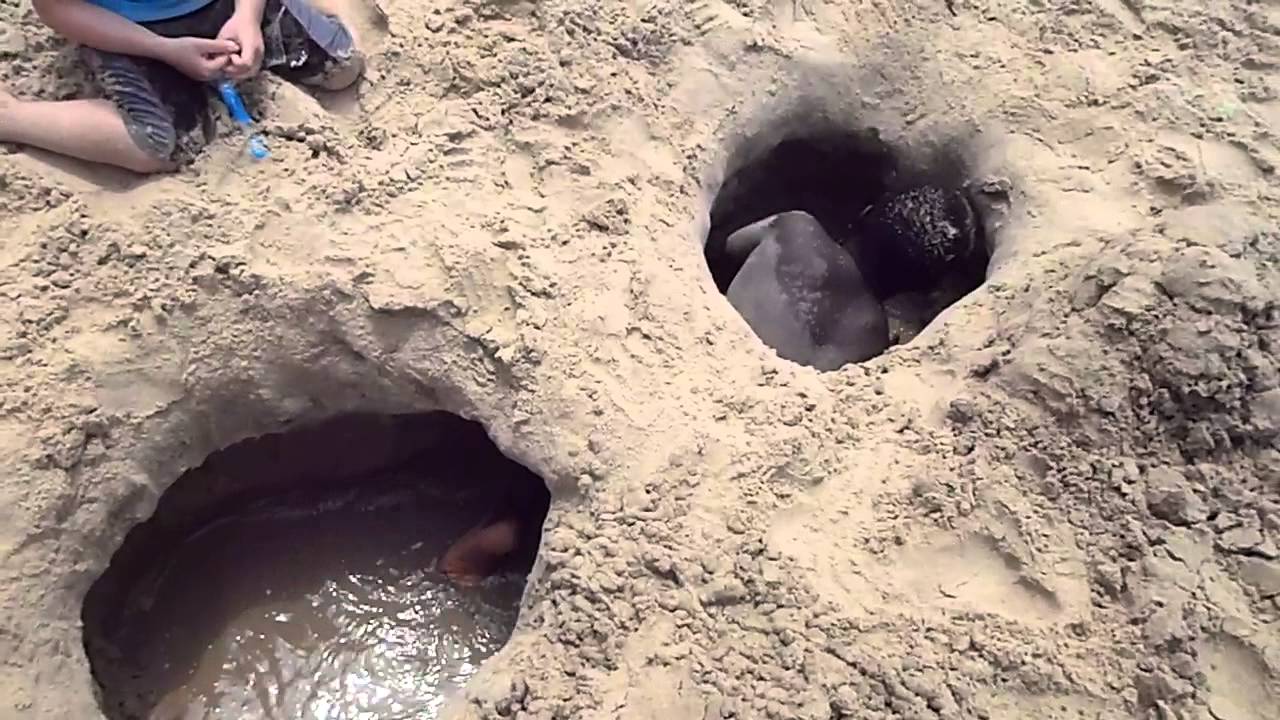 Yonatan the brave crawls via our sand tunnel - YouTube