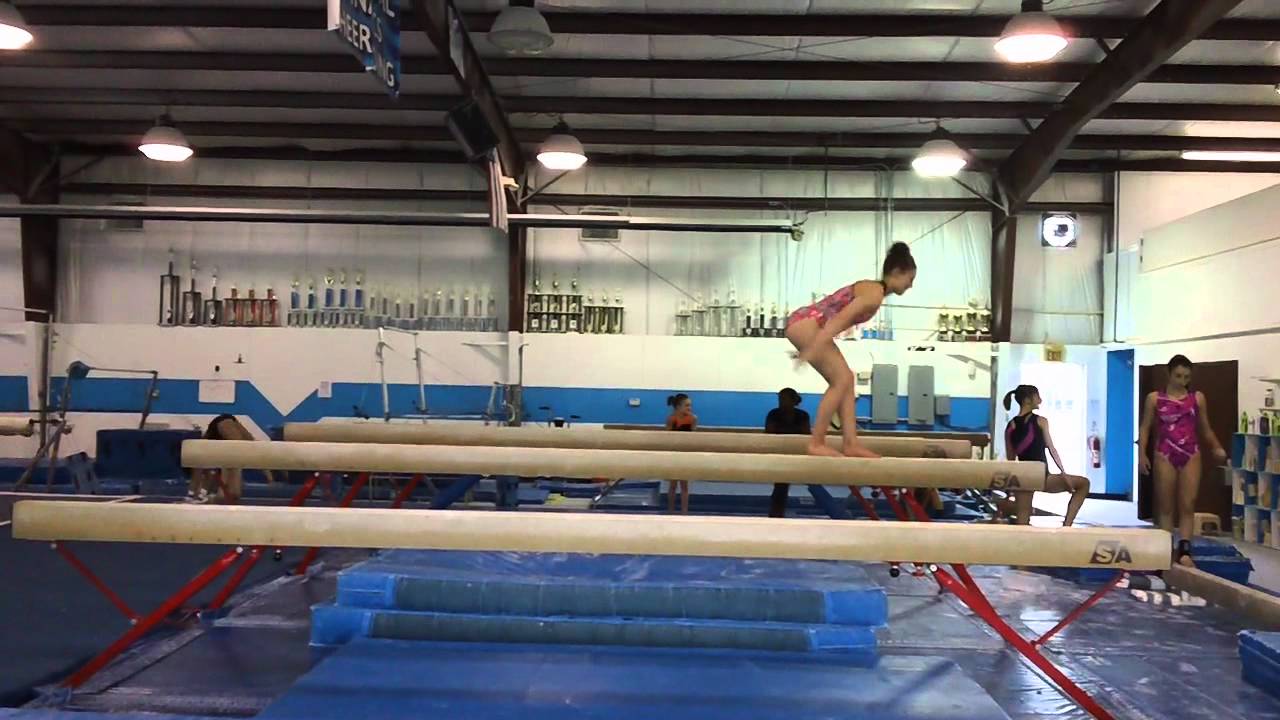 Sydney Waltz-Training BHS-Layout (2 feet) on Beam - YouTube