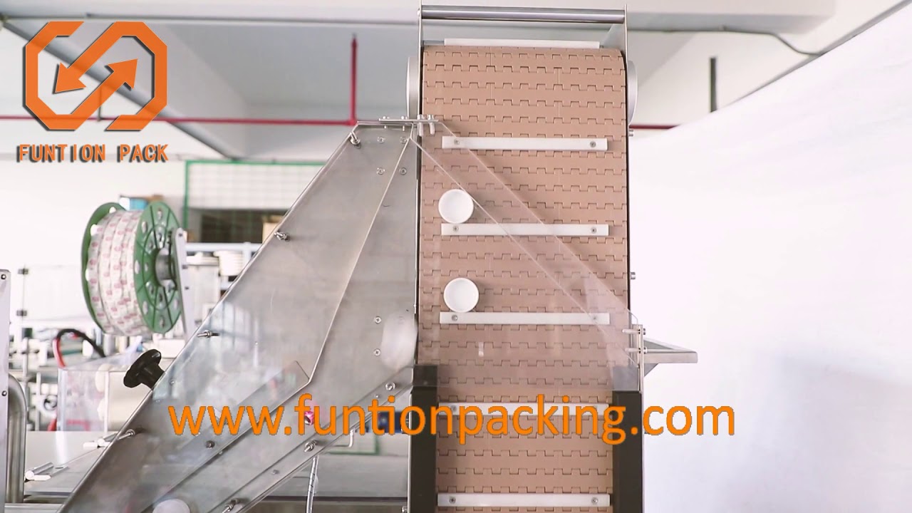Capsules bottling and capping machine - YouTube