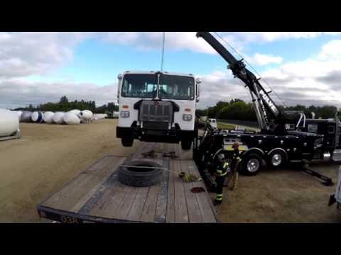 Unloading Peterbilt chassis in Minnesota - YouTube