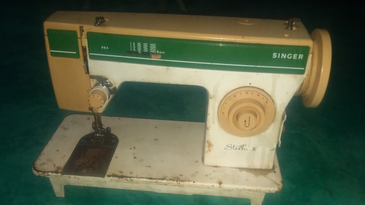 el engrane del eje central se rompió de la máquina Singer facilita 964 ...