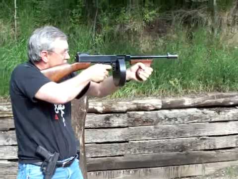Guy shooting with the classic Tommy Gun - YouTube