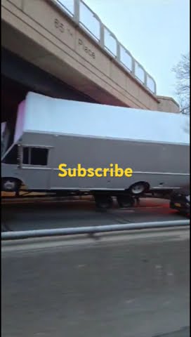 trailer stuck under a bridge - YouTube