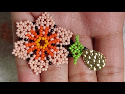 hermoso arete en Mostacilla flor huichol con hoja - YouTube