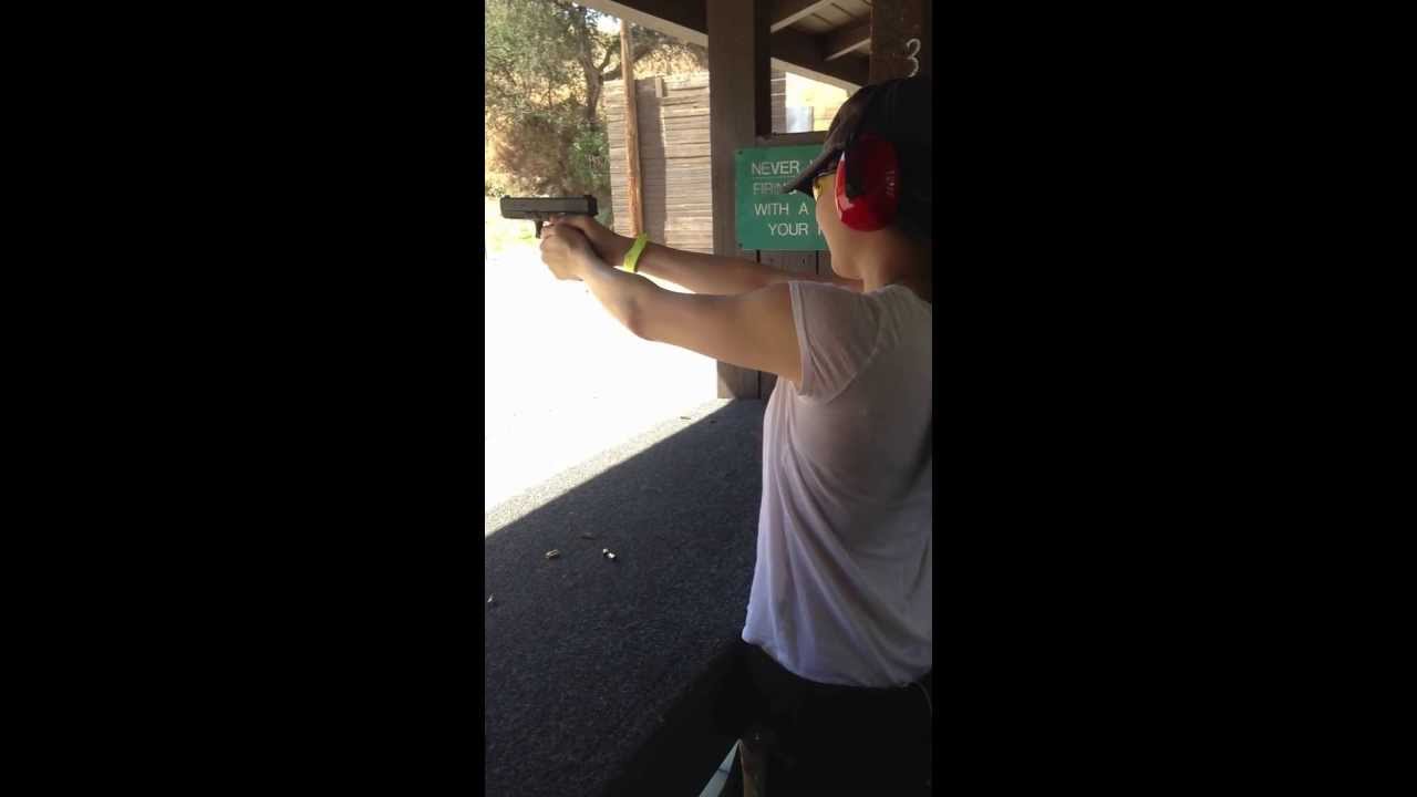 Cute Girl Shooting Glock 22 for the first time - YouTube