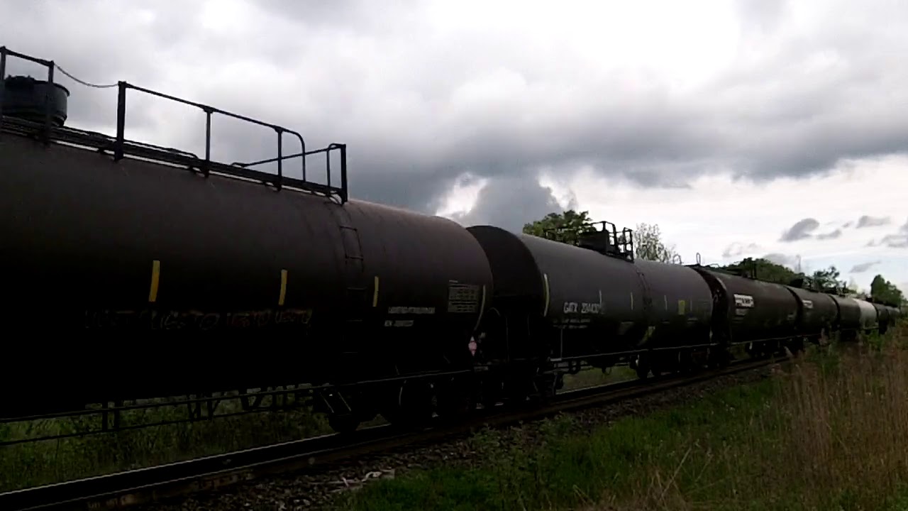 CN 435 w/ CN Engines 3855 & 3879 (CN100) lead this long 780 axle, WB ...