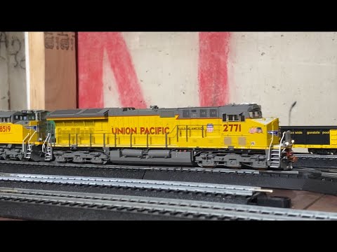 UP #2771 (New Scheme) leads a Mixed Freight with a Neat Lashup on the ...