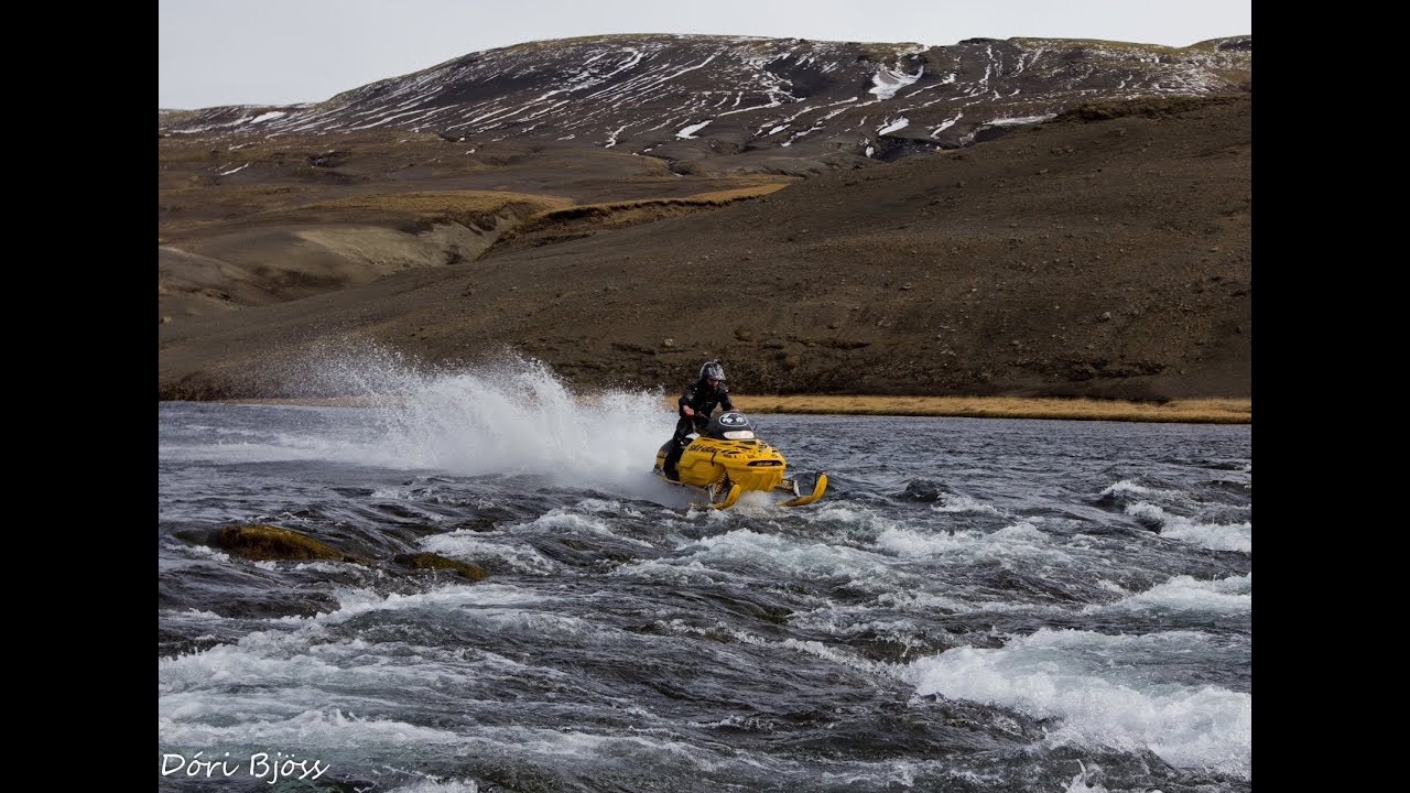 Hydroplaning snowmobile on a river - YouTube