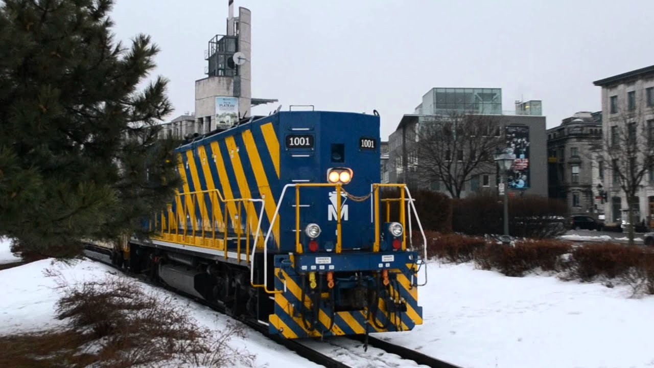 FREIGHT TRAIN PASSING THOUGH OLD MONTREAL - YouTube