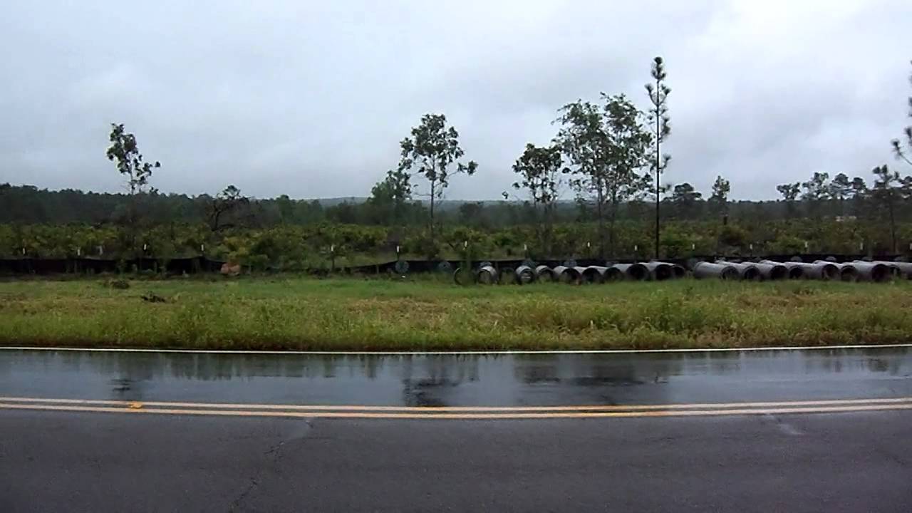 ST Wooten Corp Kenworth W900 With black hawk lowbed hauling a PC 220 ...