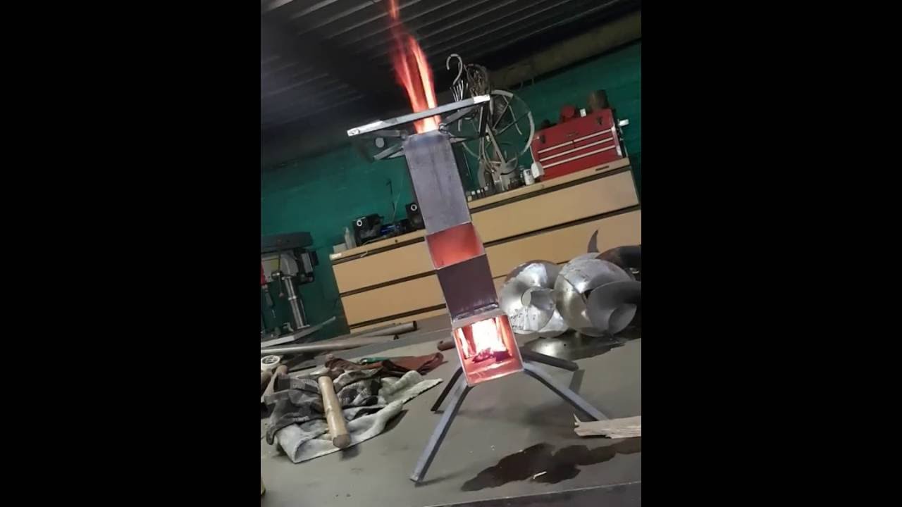 John's Tin Shed - Rocket Stove - YouTube