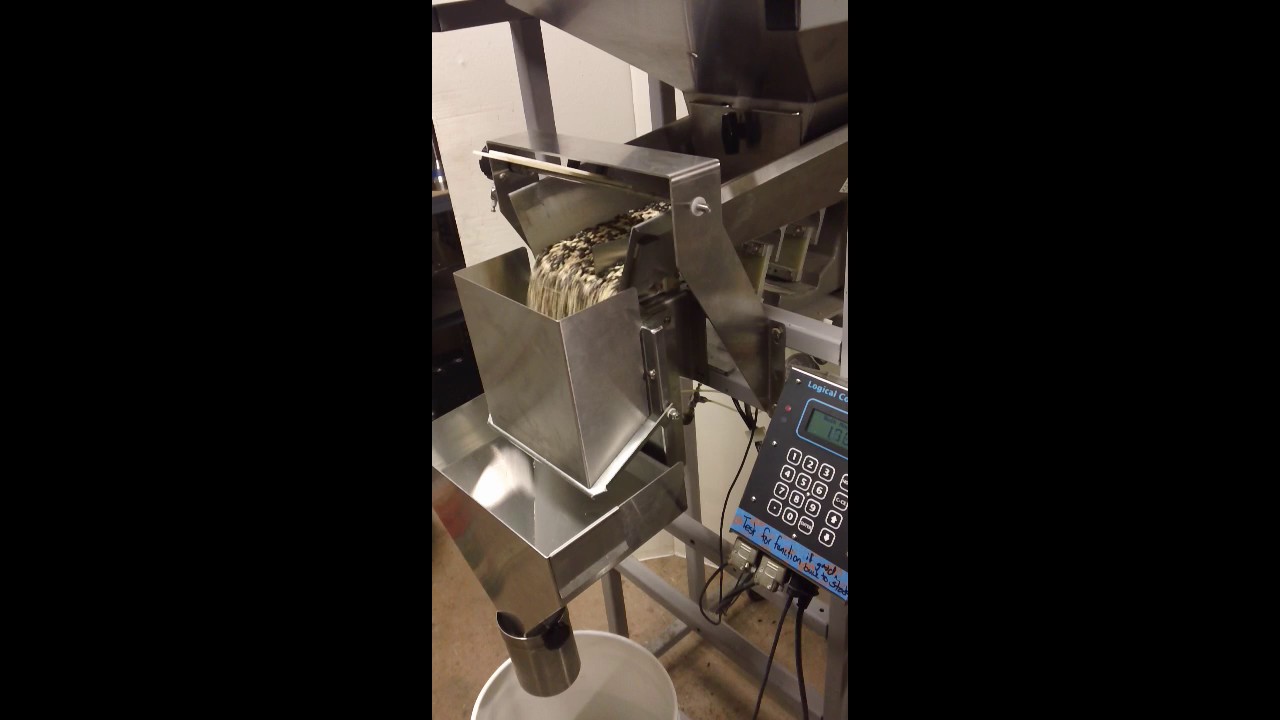 The Logical Machines Model S-4 Automatic Scale System filling 2.5lbs ...