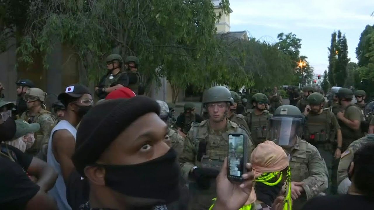 Police watch over crowd of protesters outside White House | AFP - YouTube