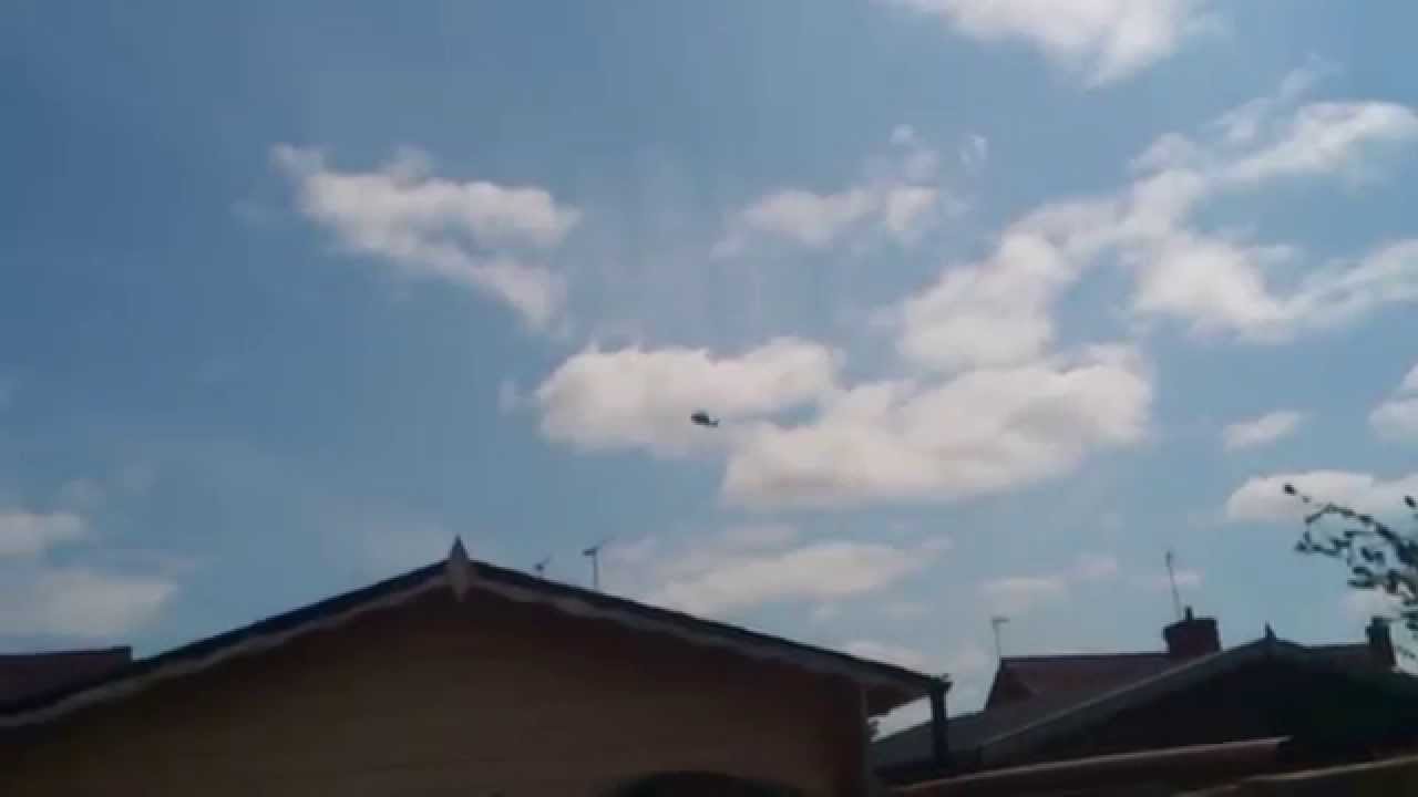 Low flying Helicopter over my house - YouTube