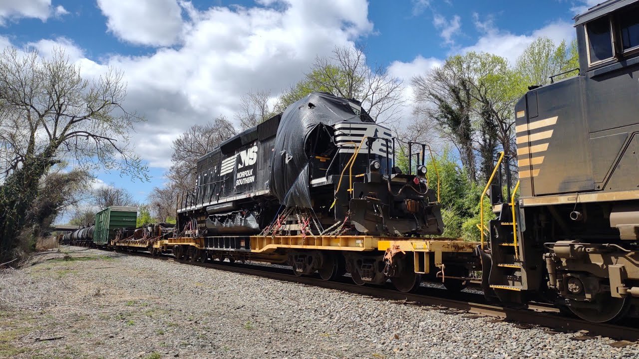 NS 12R with with NS 1648 on a flatcar in Charlottesville Virginia - YouTube