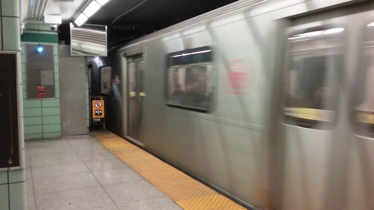TTC Toronto Rocket departing St George - YouTube