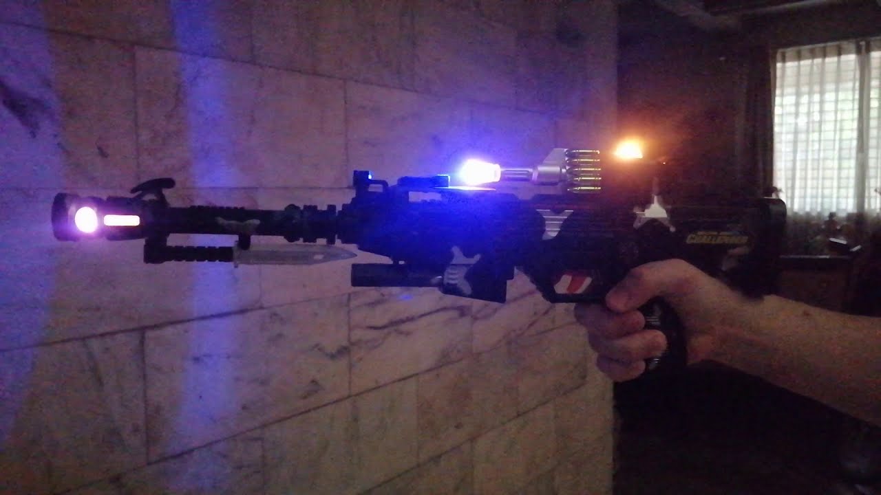 Combat Gun with Flashing Lights and Sound Battery Operated - YouTube