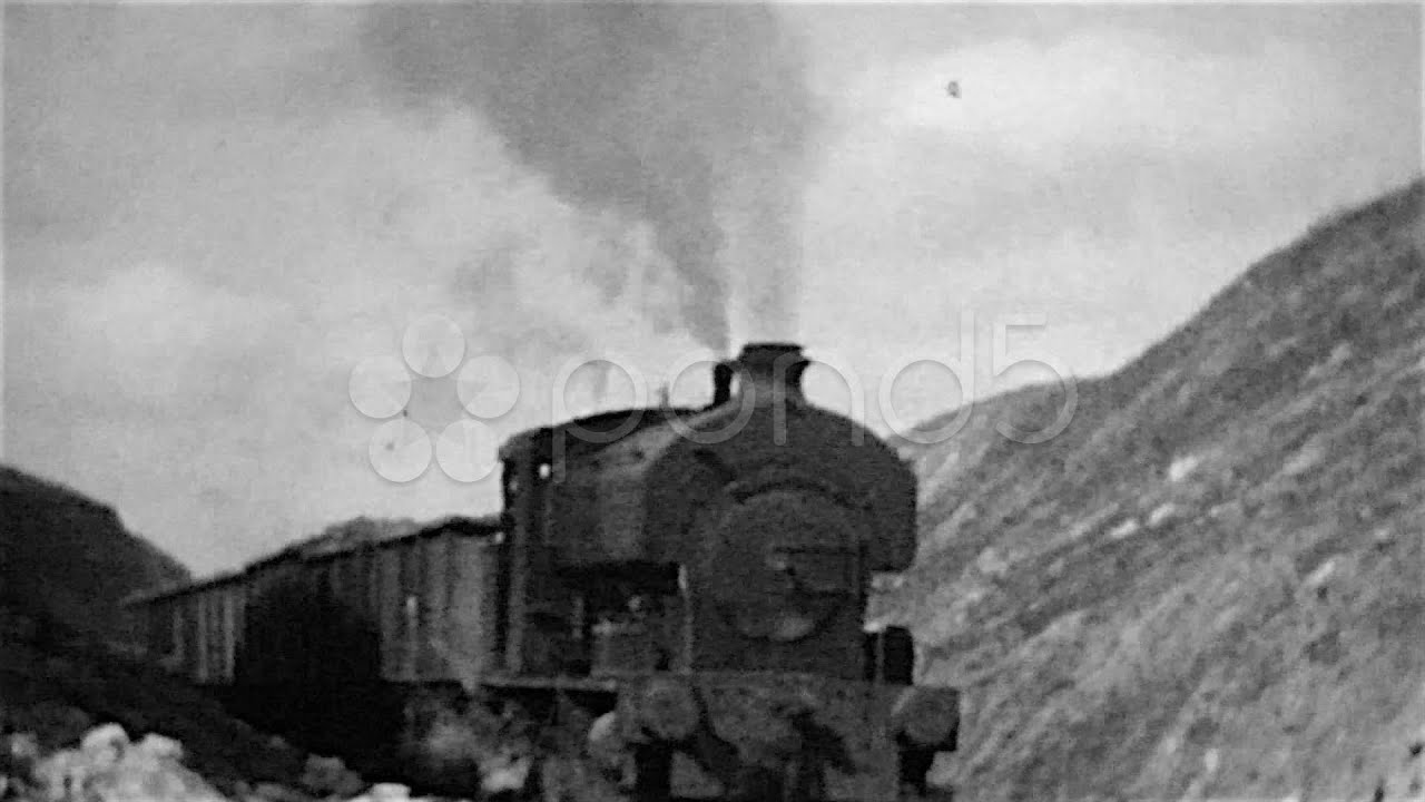 Steam Locomotive Working In An Ironstone Quarry Old Bandw Film. Stock ...